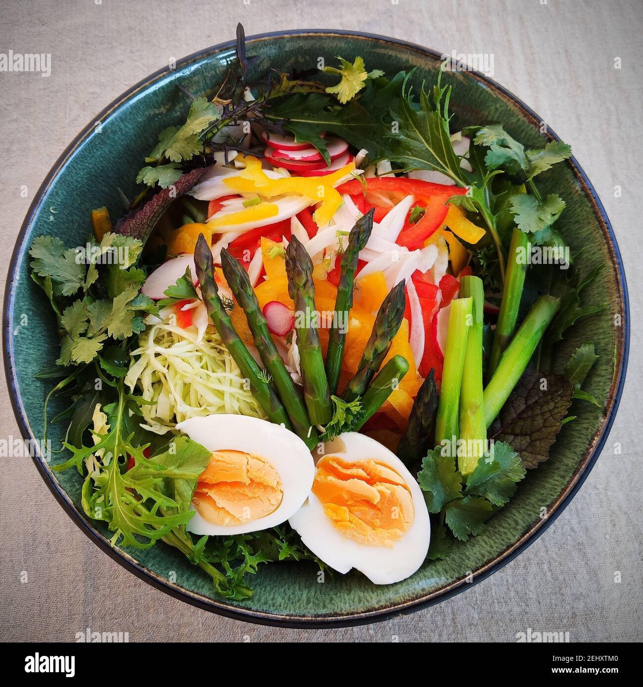 Top view of tasty fresh vegetable crudites with sliced egg on a plate ...