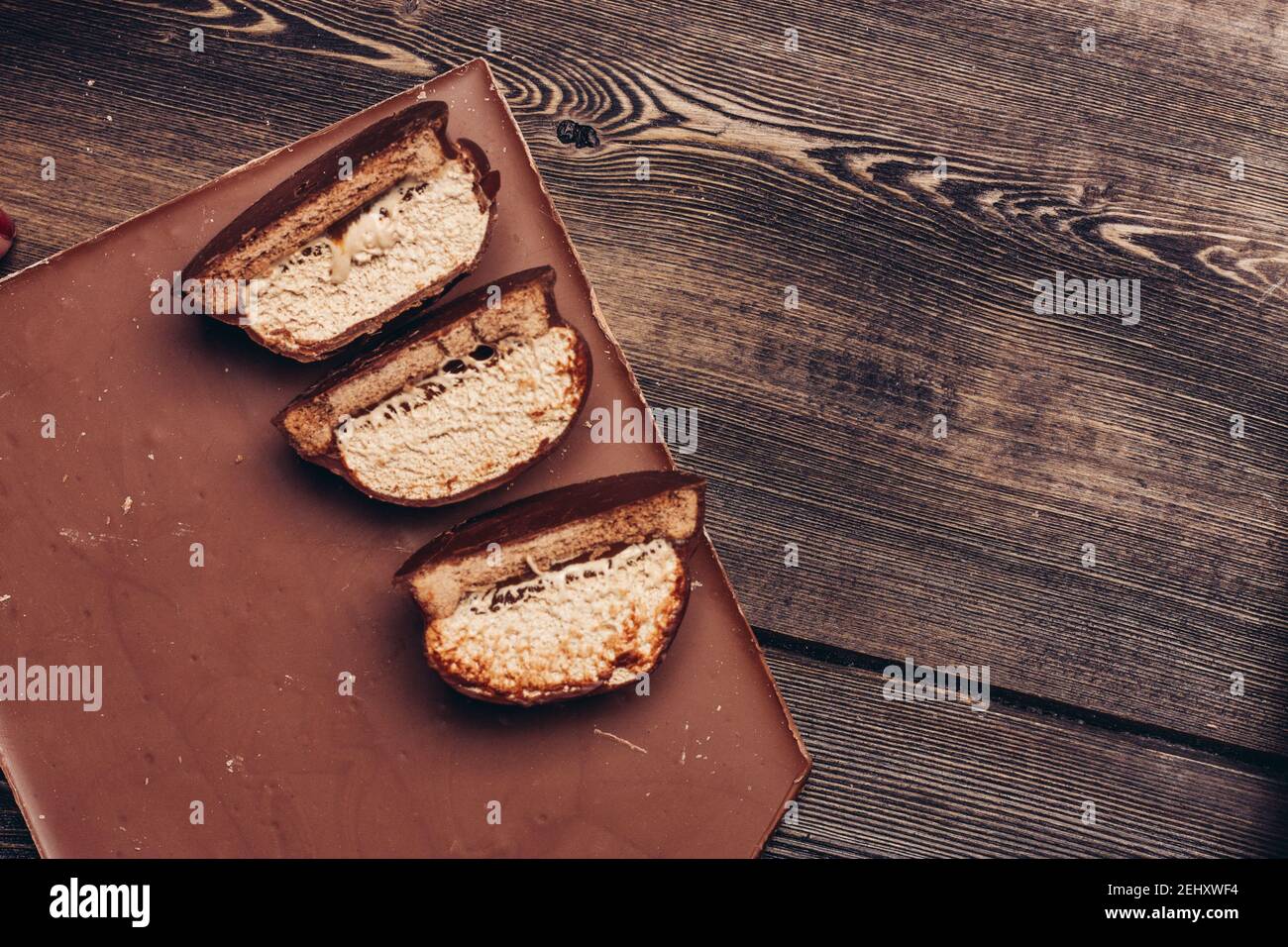 chocolate and pastries on wooden table background image texture ...