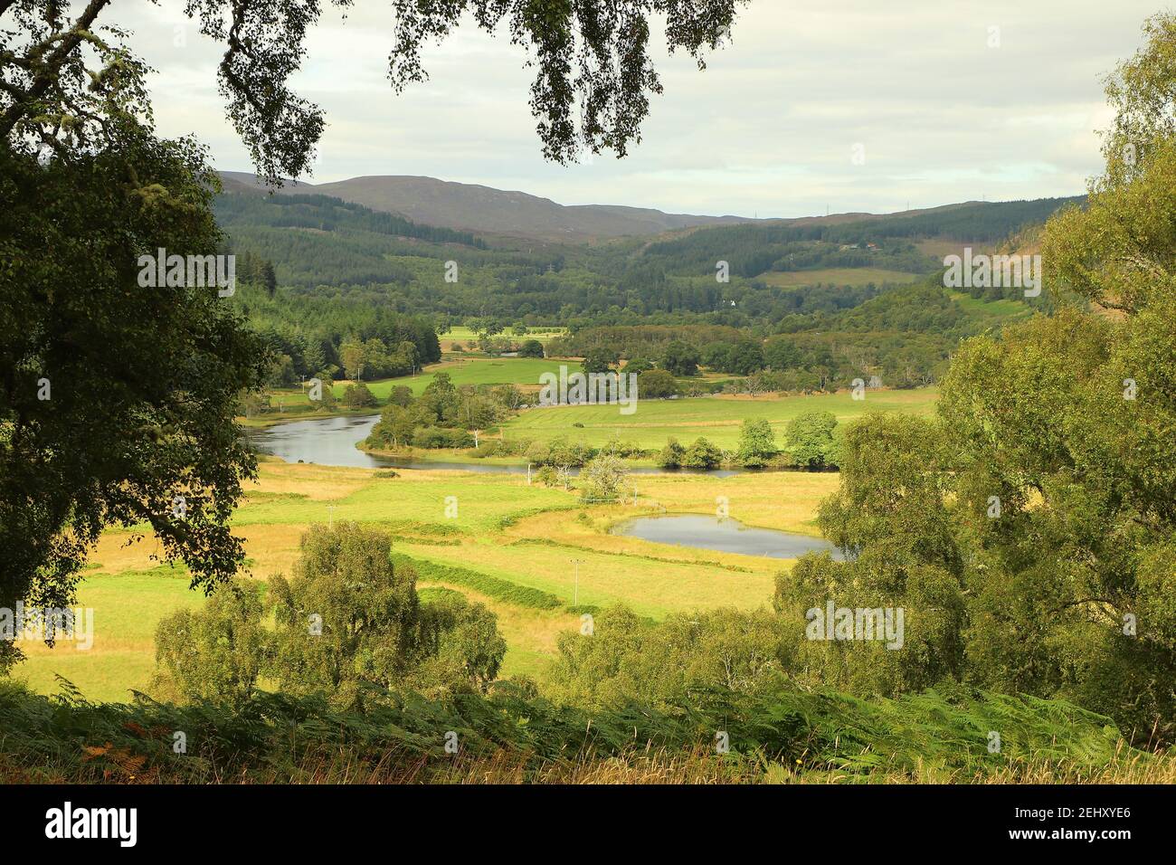 A view down from the hills of Scotland to the glens, rivers and lochs ...