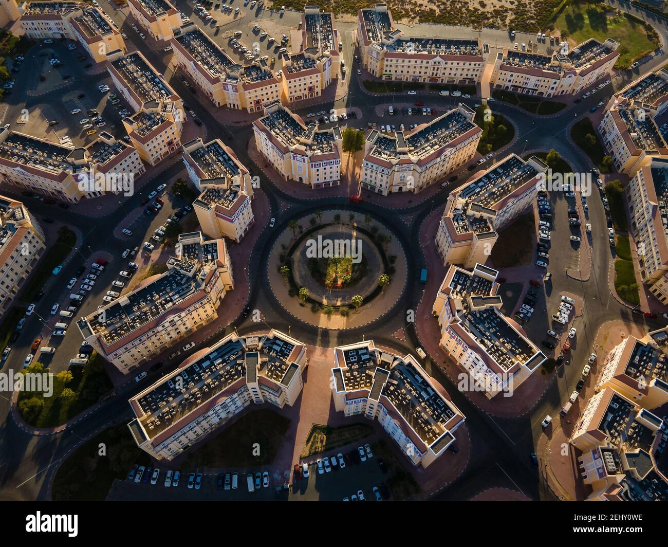 Roundabout and architectural symmetry of International City in Dubai ...