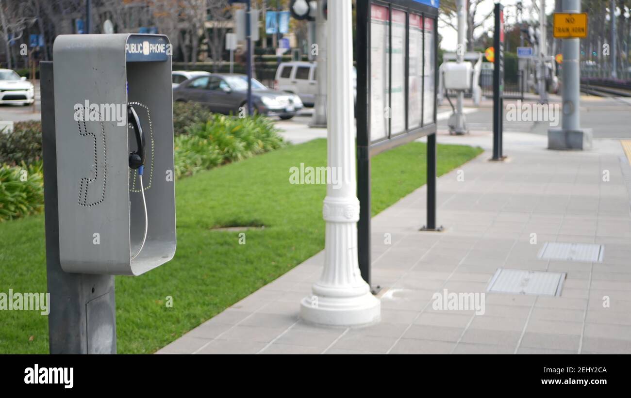 Retro coin-operated payphone station for emergency call on street ...