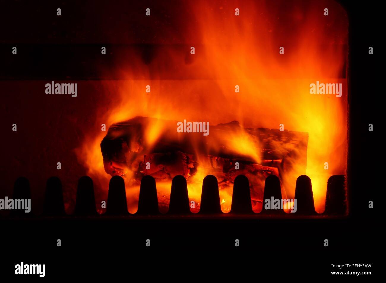 Blazing fire place on a cold evening Stock Photo - Alamy
