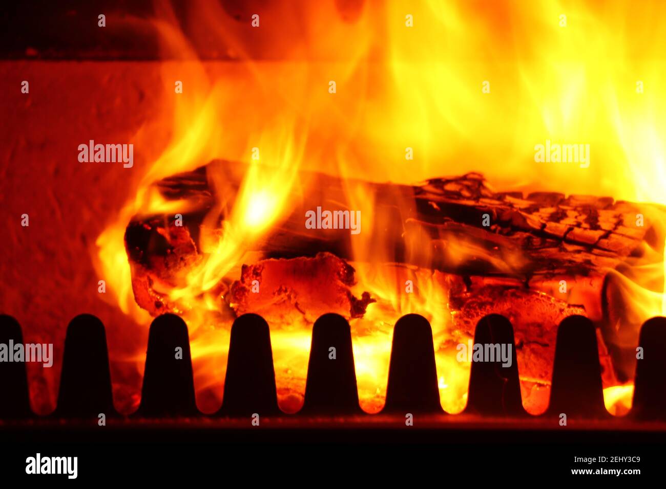 Blazing fire place on a cold evening Stock Photo - Alamy
