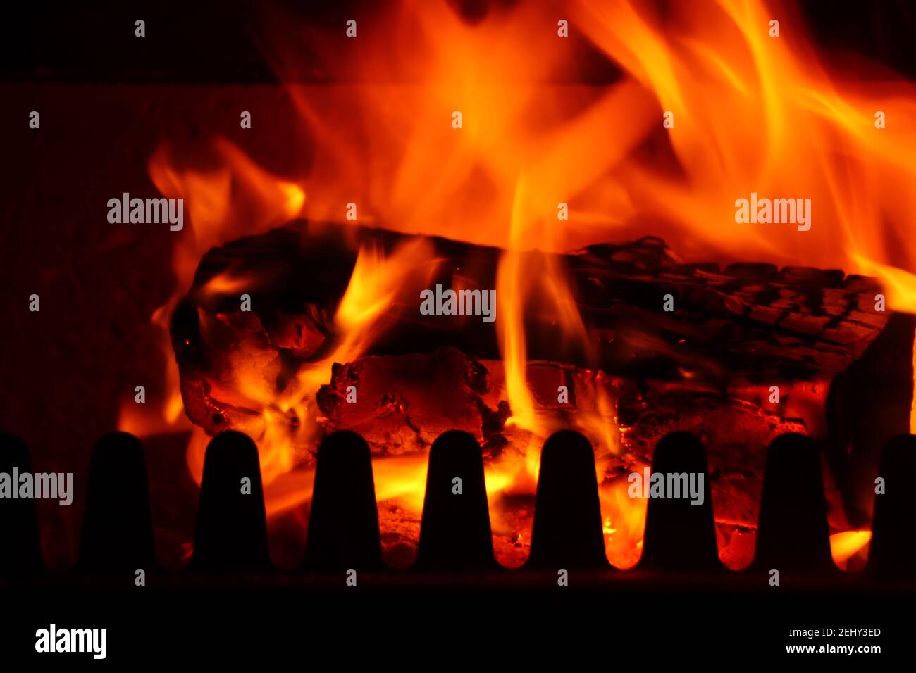 Blazing fire place on a cold evening Stock Photo - Alamy