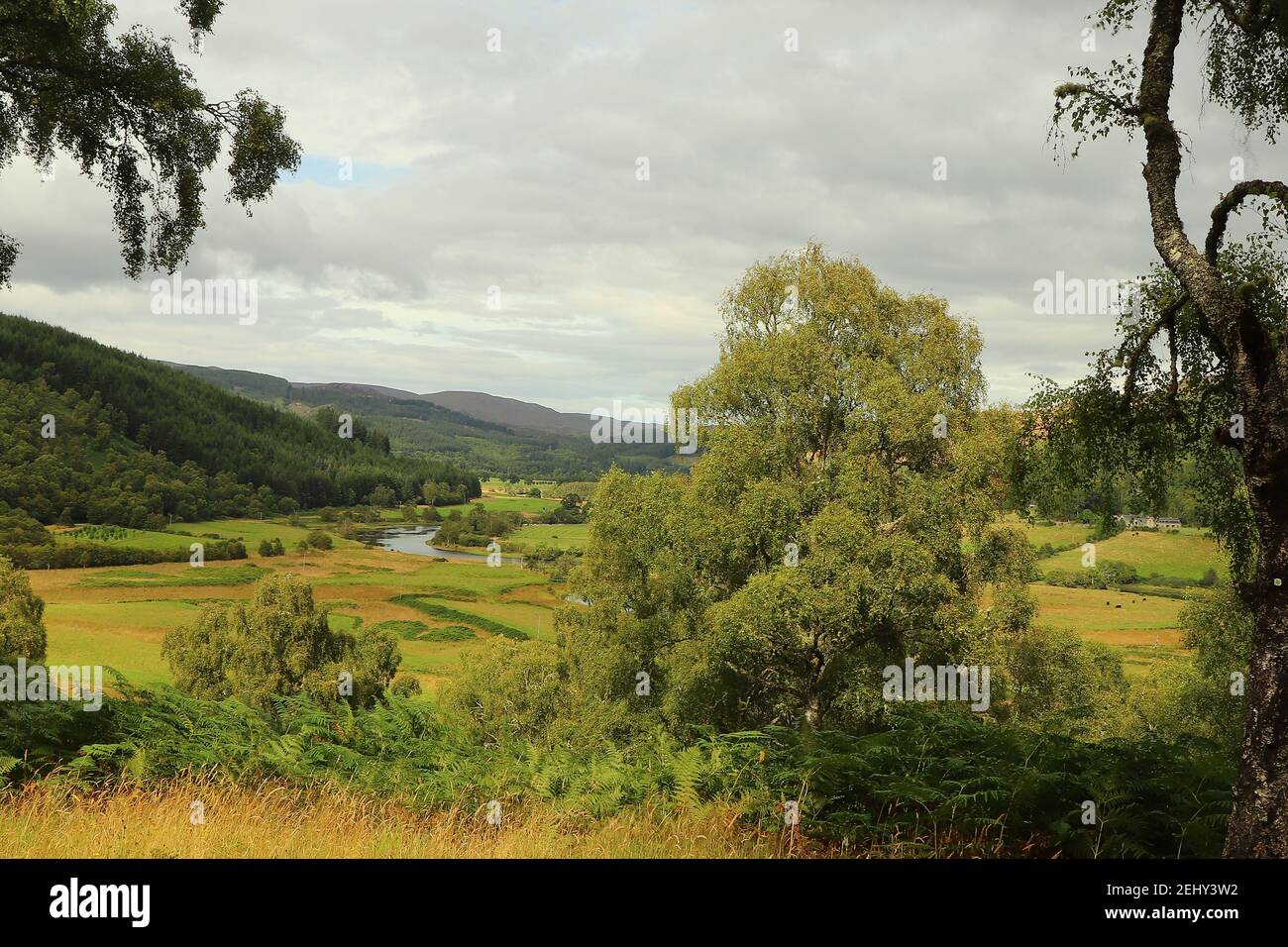 A view down from the hills of Scotland to the glens, rivers and lochs ...