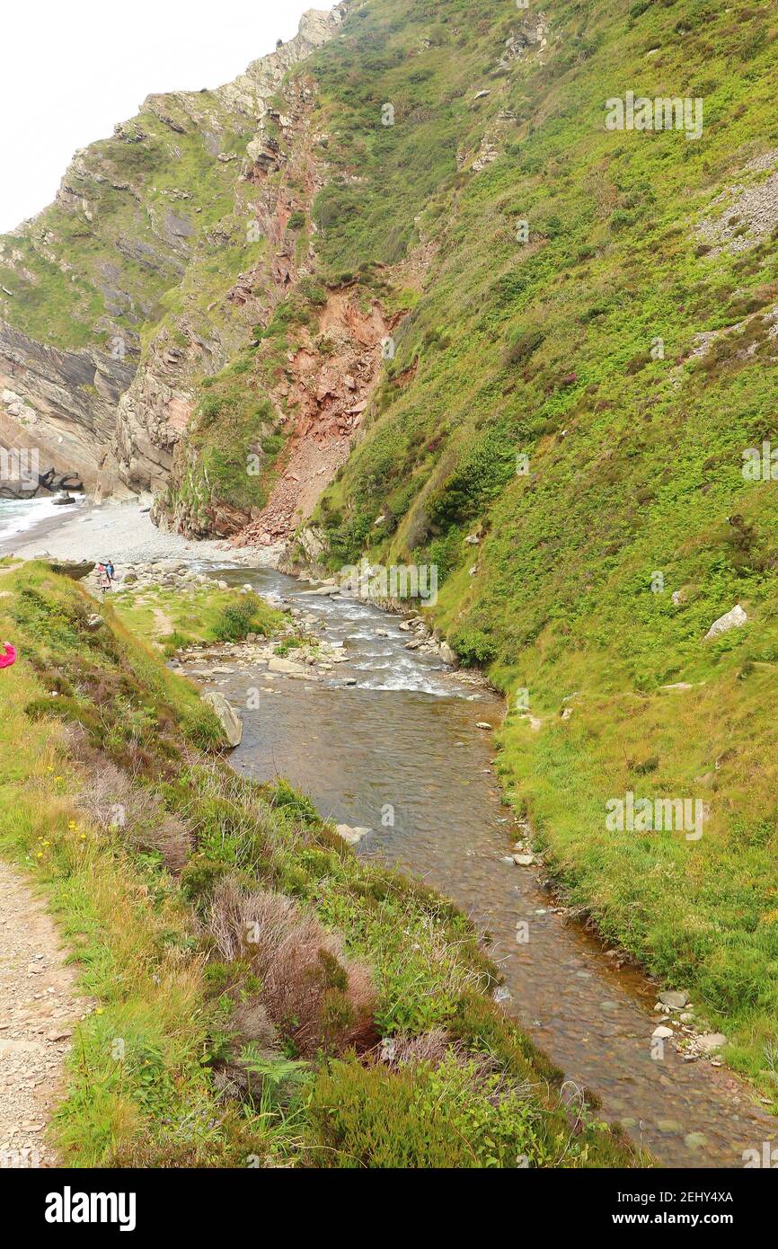 Heddon river flowing through the valley and over rocky ground Stock ...