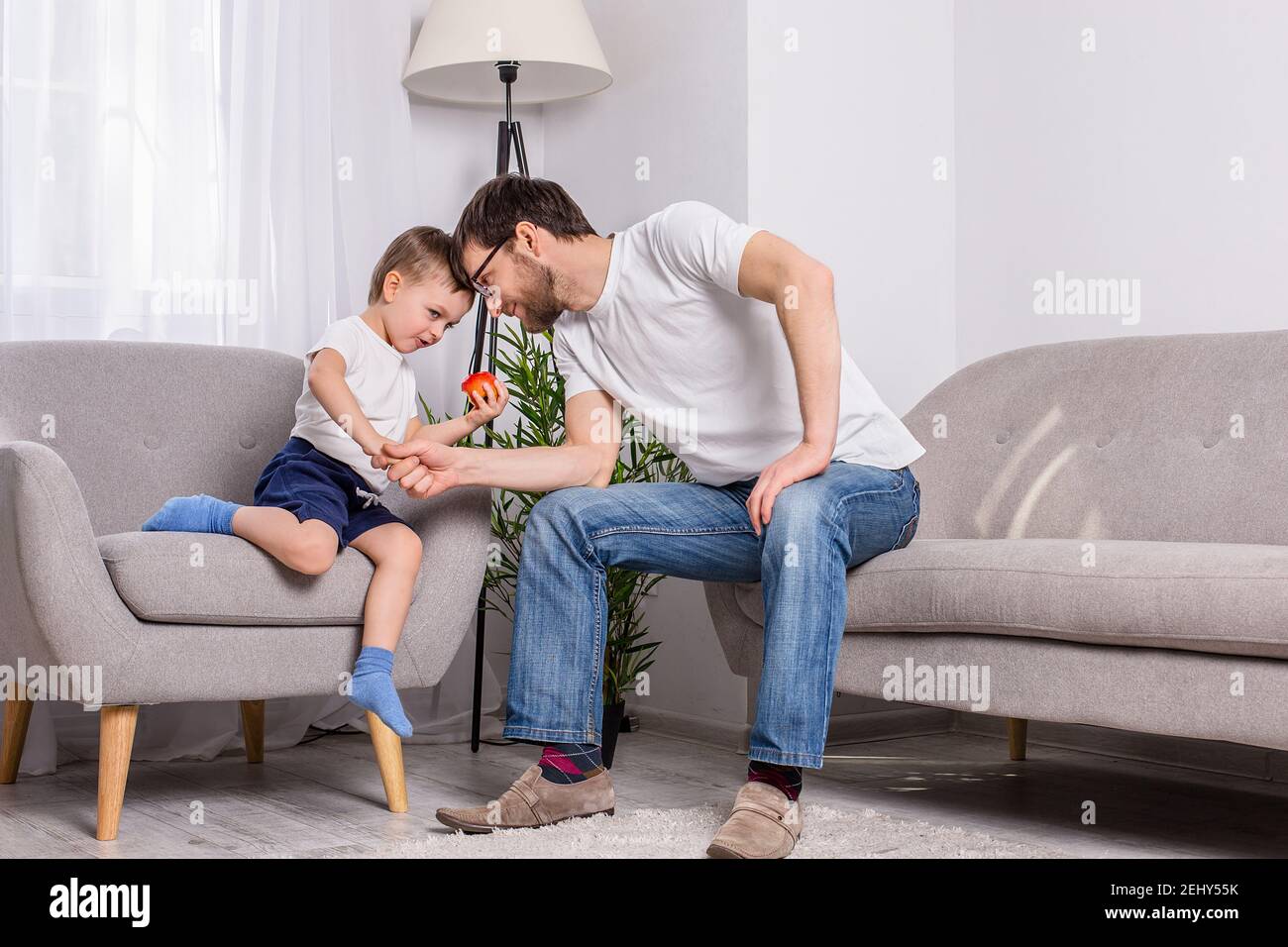 Serious conversation parent and child hi-res stock photography and ...