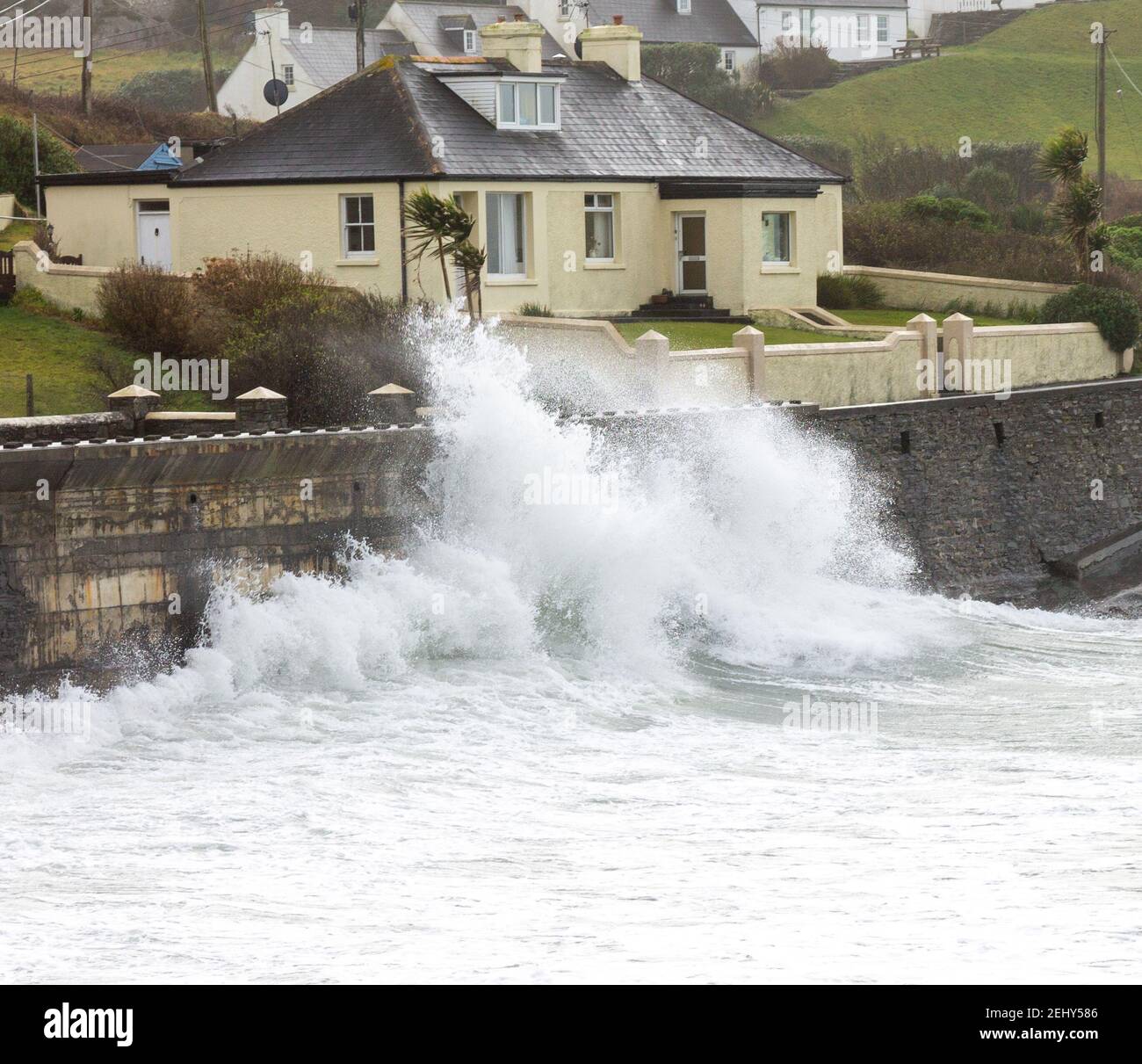Winter Storm waves breaking against Sea Wall Tragumna West Cork Ireland ...