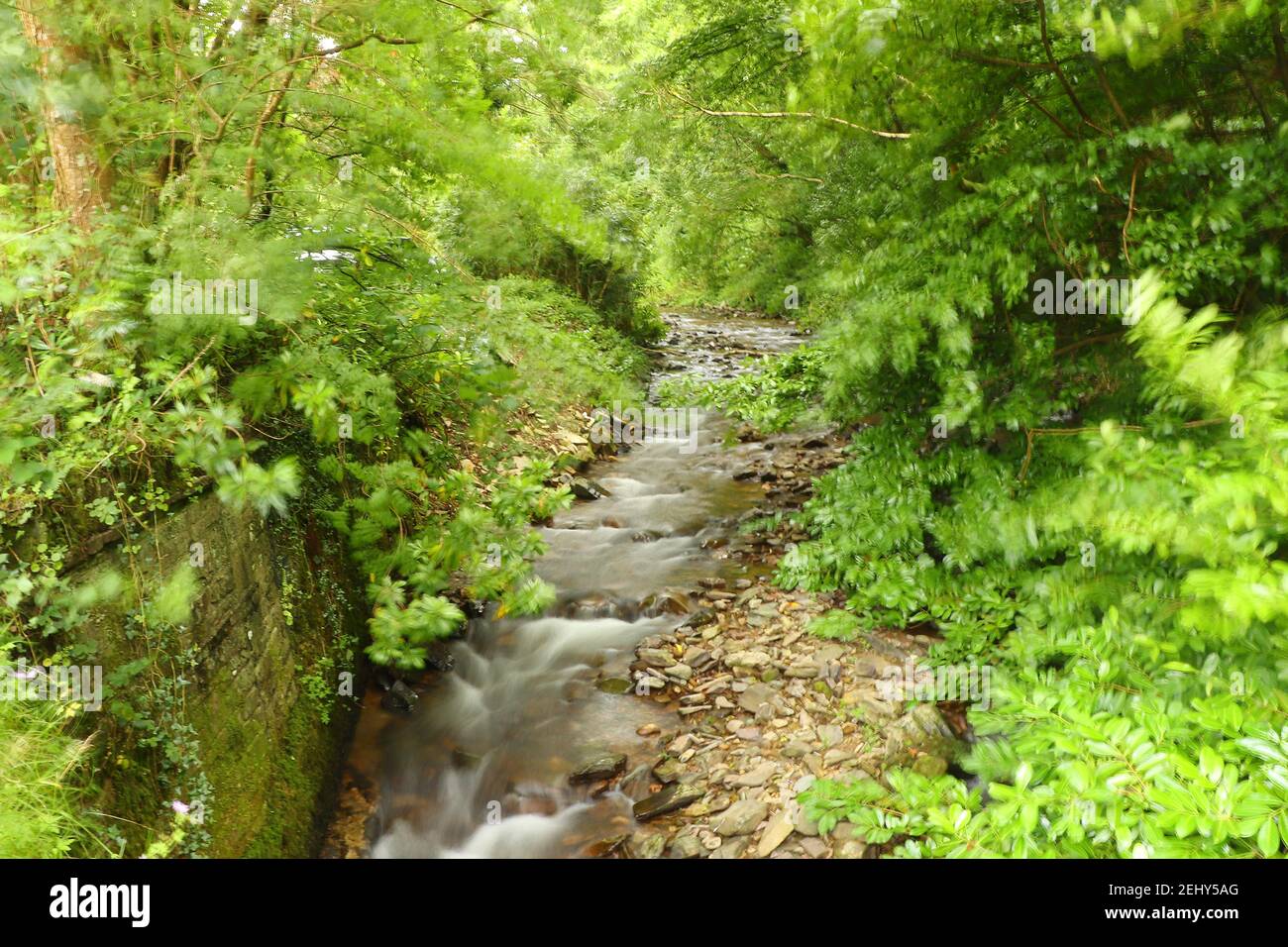 Heddon river flowing through the valley and over rocky ground Stock ...