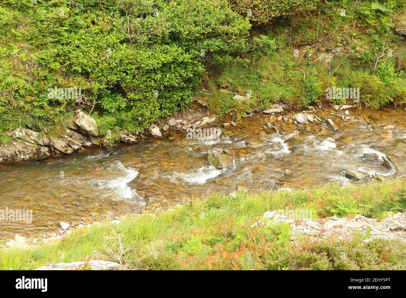 Heddon river flowing through the valley and over rocky ground Stock ...