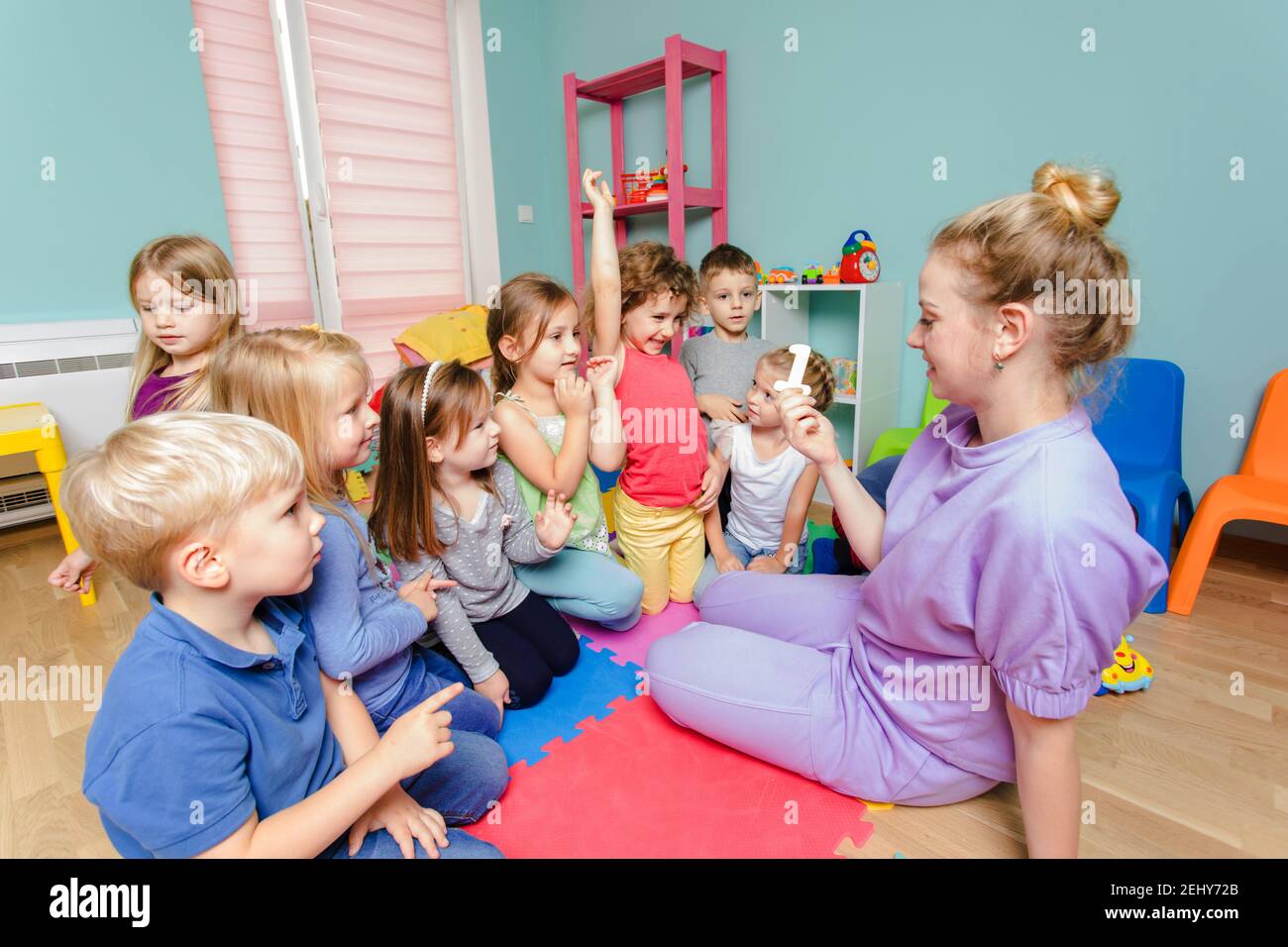 Providing new teaching methods with very young learners Stock Photo - Alamy