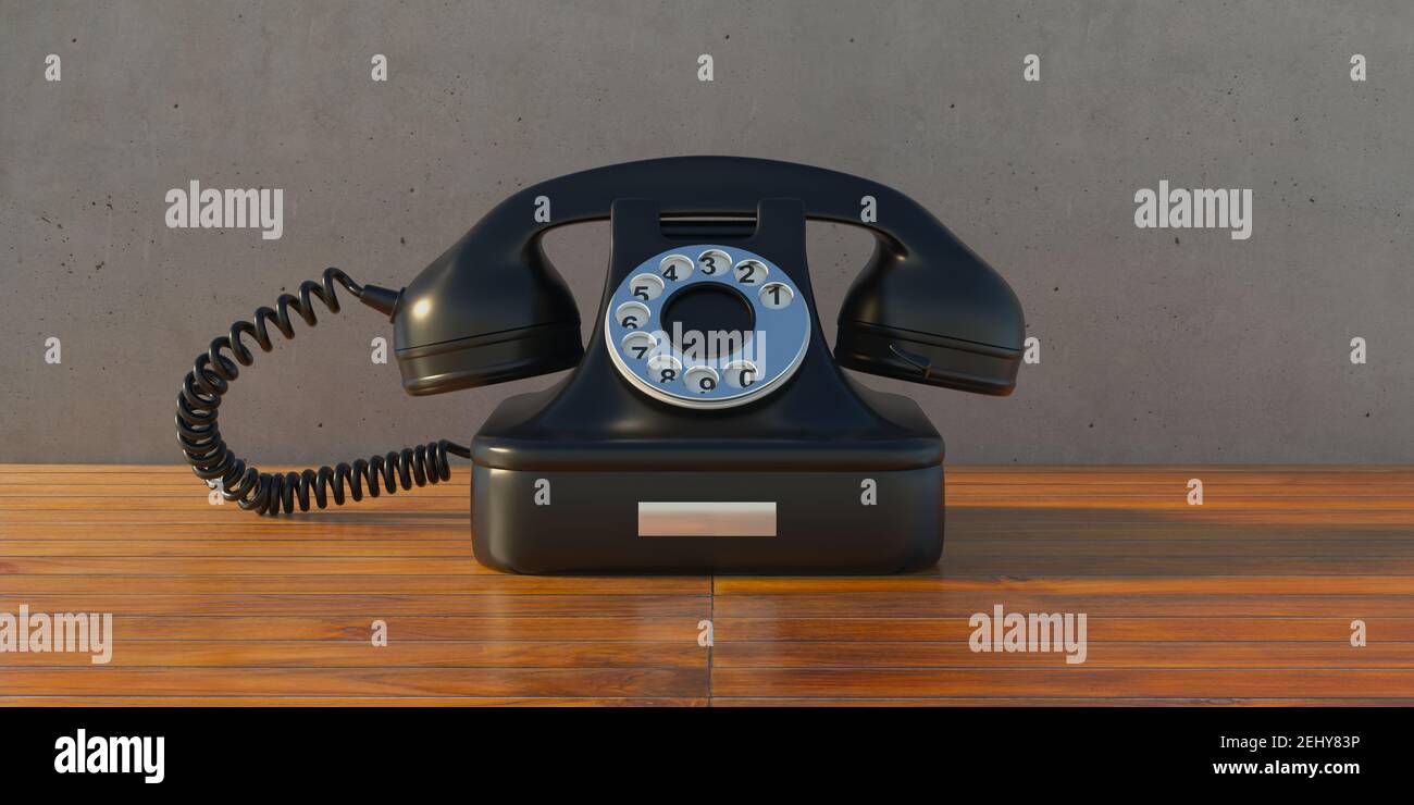 Retro telephone, old vintage phone on wooden office desk. Black color ...