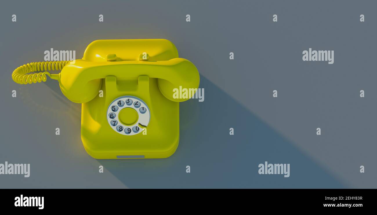 Vintage telephone, old retro phone on gray background, Yellow color ...