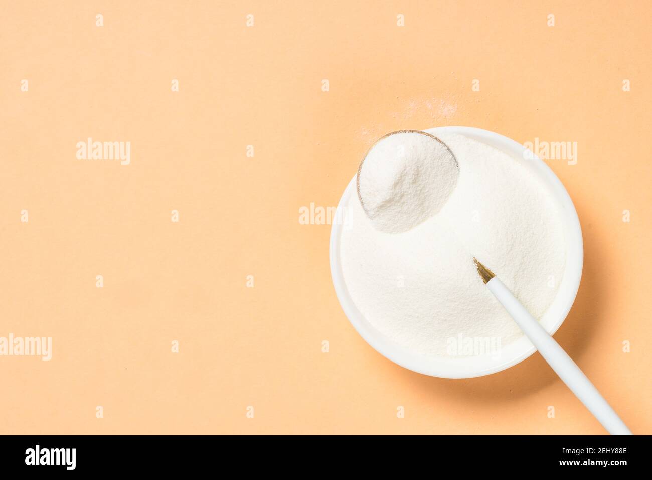 Collagen powder dietary supplement at blue Stock Photo - Alamy