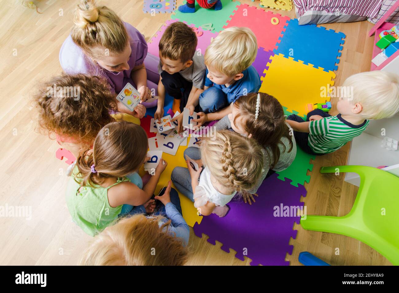 Educational group activity at the kindergarten or daycare Stock Photo ...