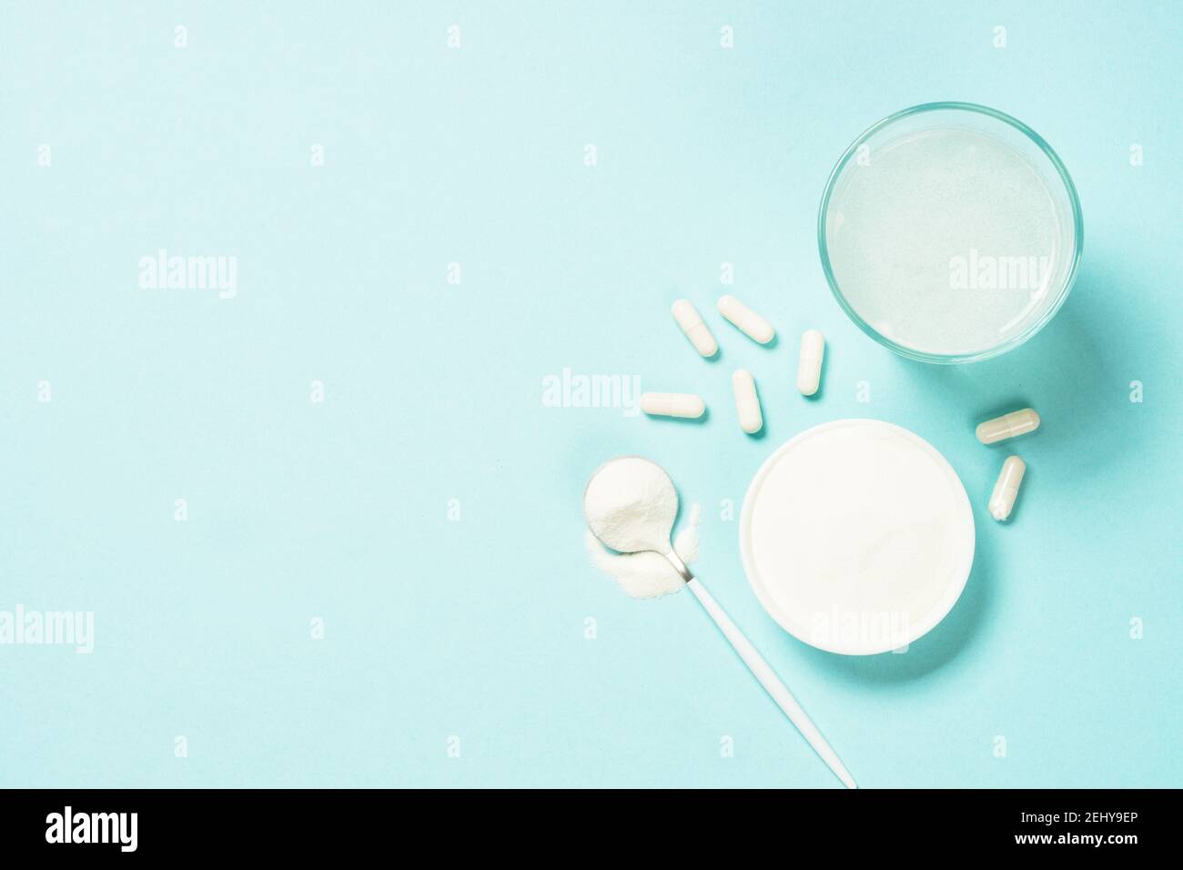 Collagen powder drink, dietary supplement at blue Stock Photo - Alamy