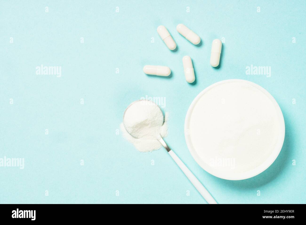 Collagen powder dietary supplement at blue Stock Photo - Alamy