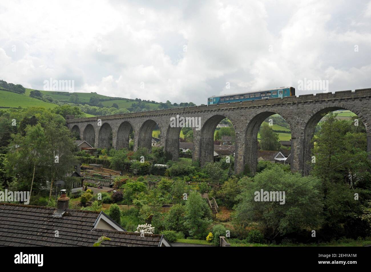 An Arriva Trains Class 153 DMU crosses the Knucklas viaduct on the ...