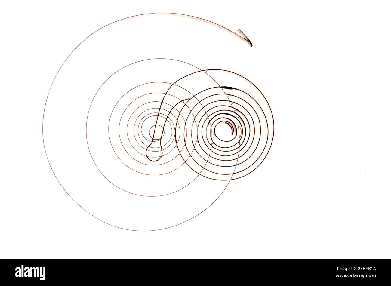 Top view of metal springs on a white background Stock Photo - Alamy