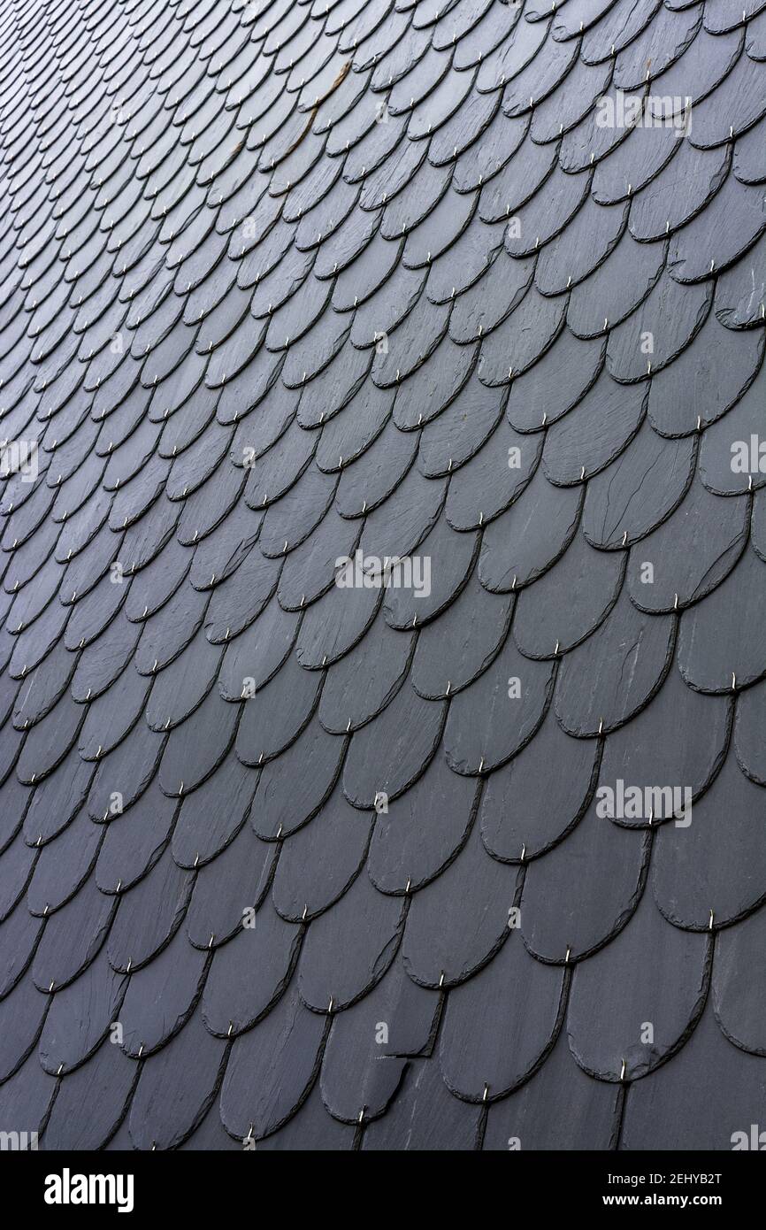 Vertical shot of slate roof tiles on a house, in France Stock Photo - Alamy