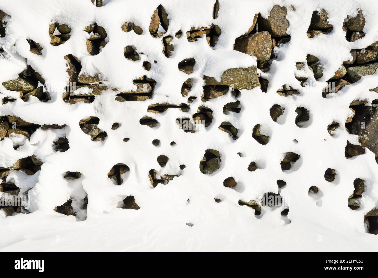 Snow covered drystone wall in the High Peak, Derbyshire, England Stock ...