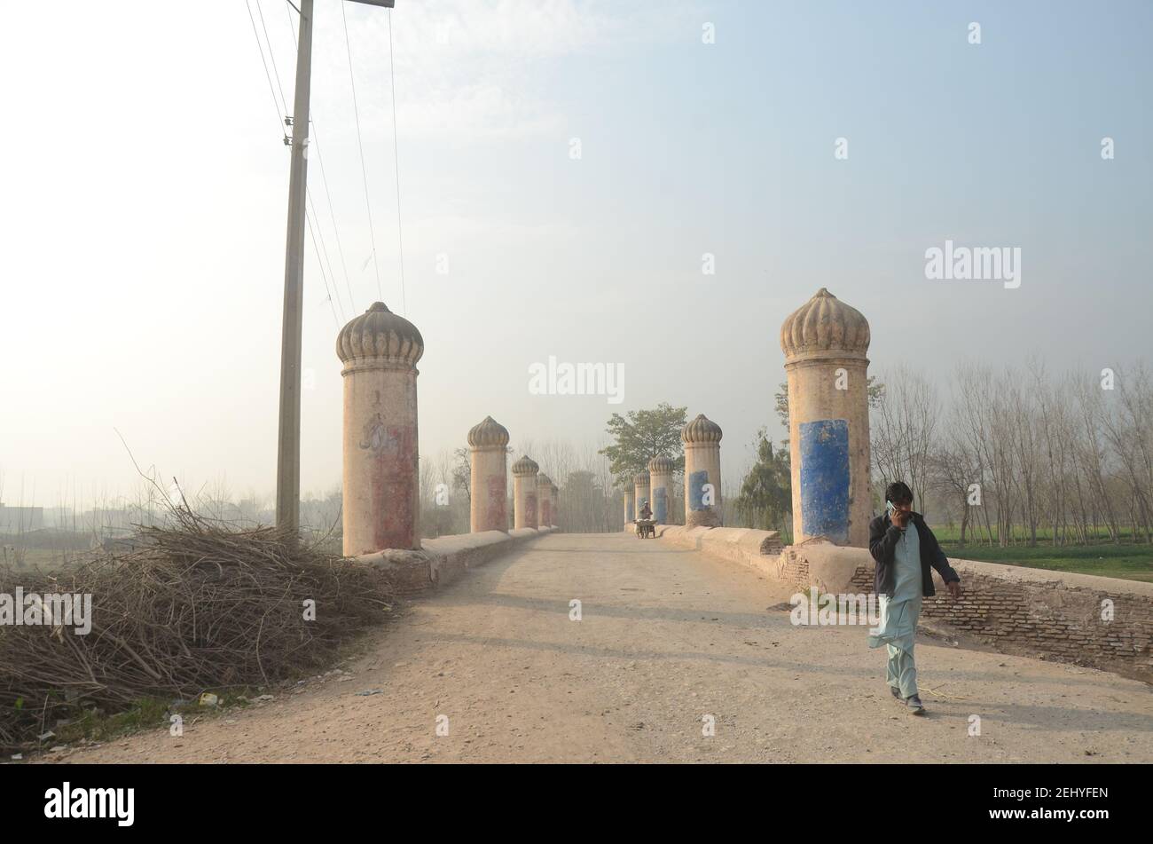 People crosses the Bara Bridge. The historic Chuha Gujar also known as ...