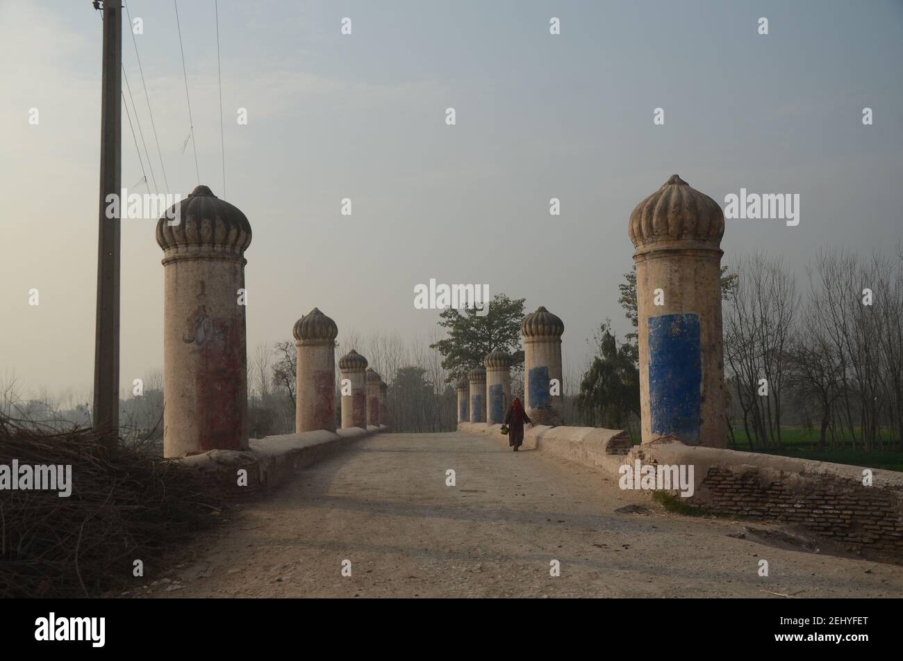People crosses the Bara Bridge. The historic Chuha Gujar also known as ...