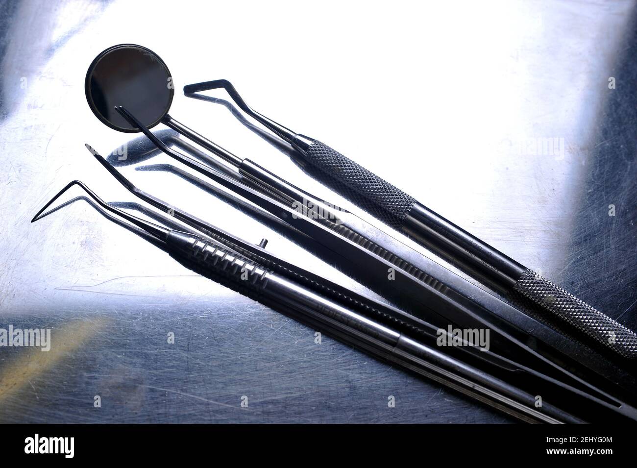 Dentist tools on white surface hi-res stock photography and images - Alamy