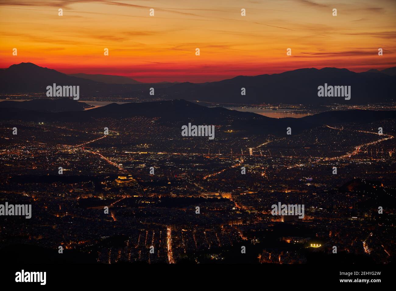 Late sunset before night over Athens of Greece with the illuminated ...