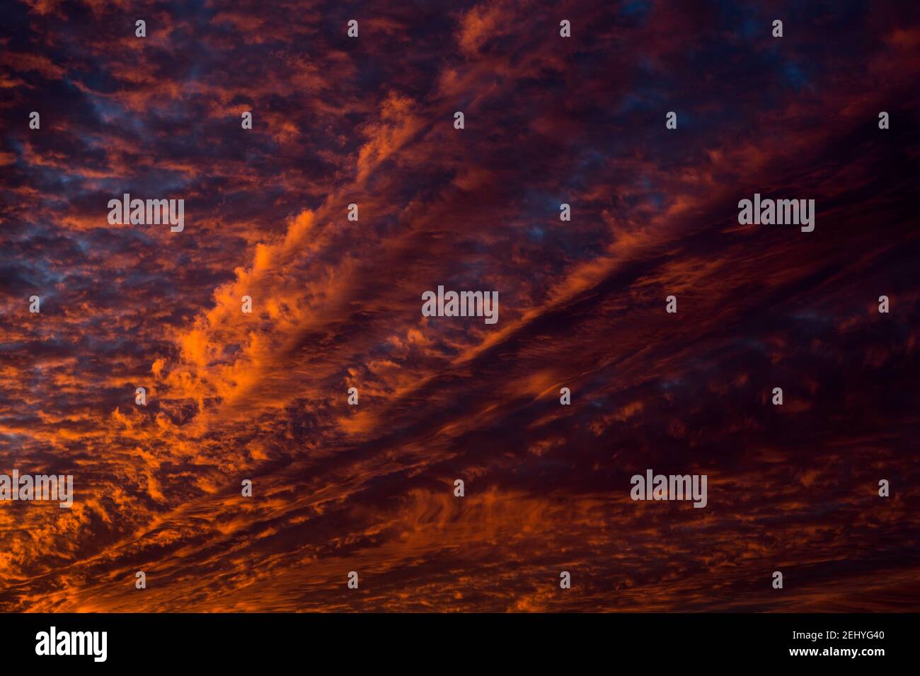 Dark Colors in the Cloudy Orange Shaded Sky Stock Photo - Alamy
