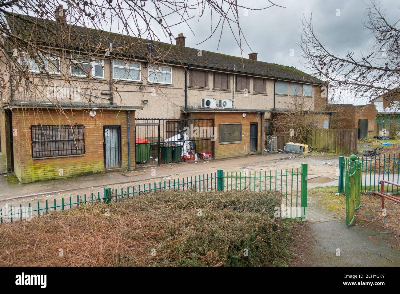 A rundown, litter-strewn area in a deprived council estate in Bradford ...