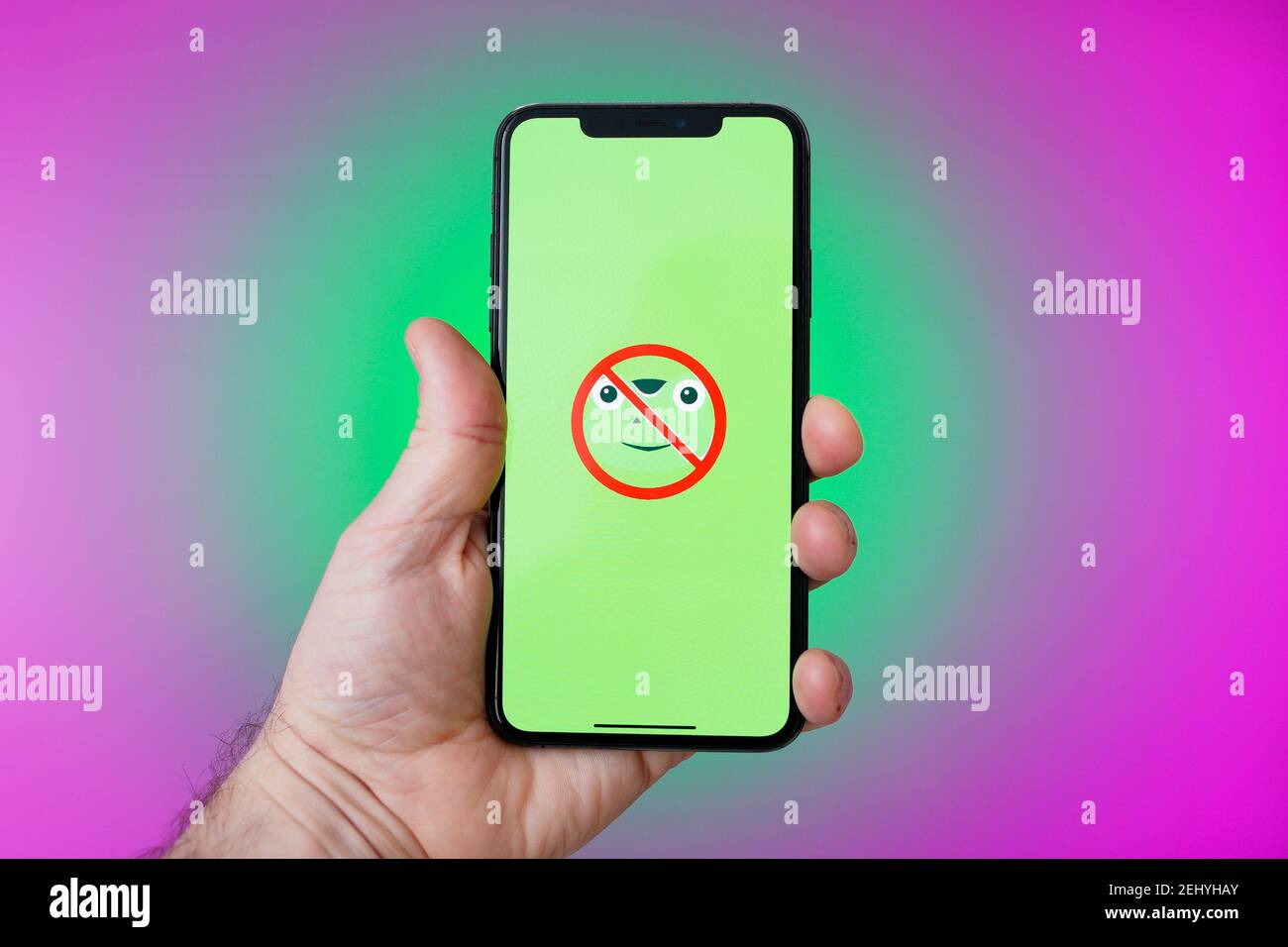 The Gab frog logo is seen with a prohibited sign on an iPhone 11 Pro ...