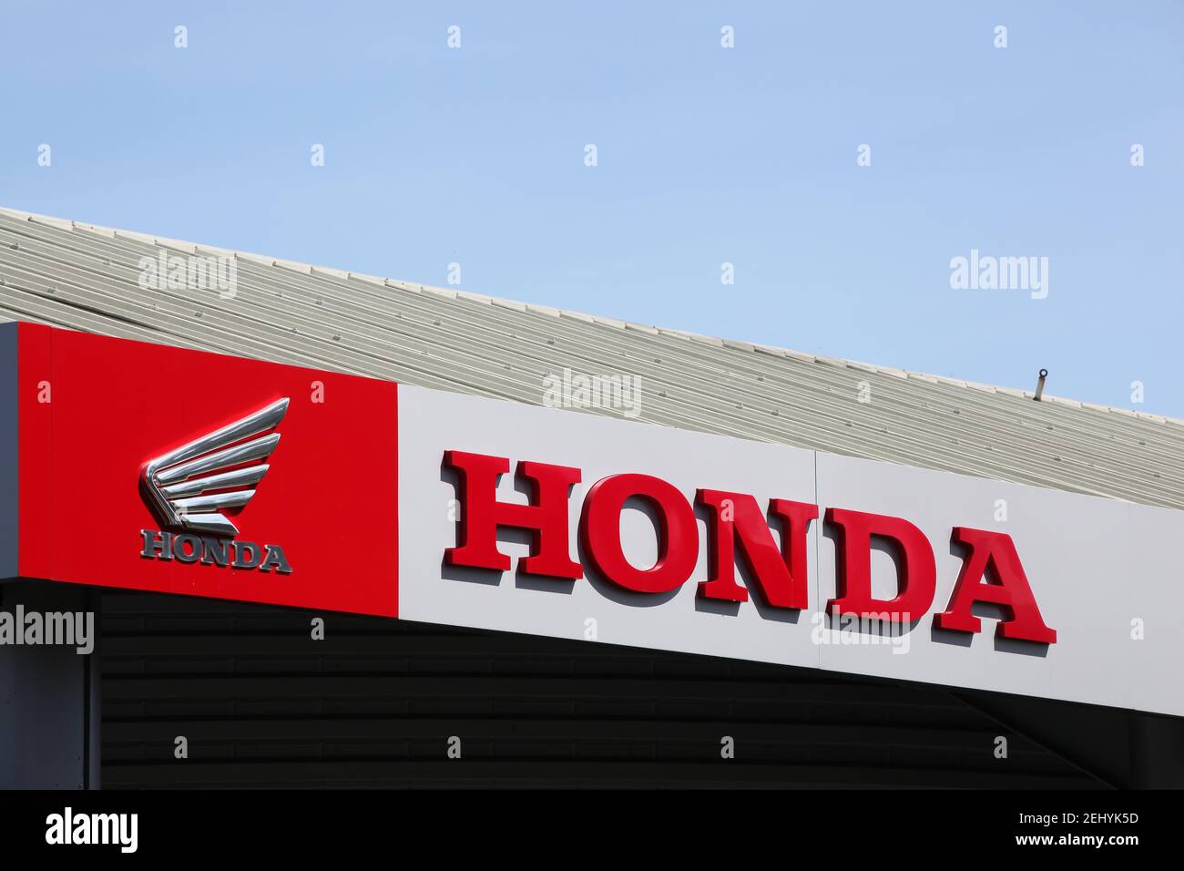 Villefranche, France - May 24, 2020: Honda logo on a building. Honda is ...