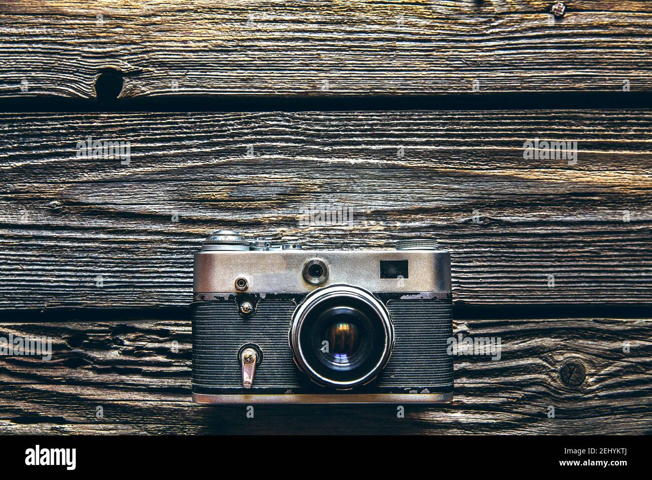 Vintage camera on wooden background and Stock Photo - Alamy