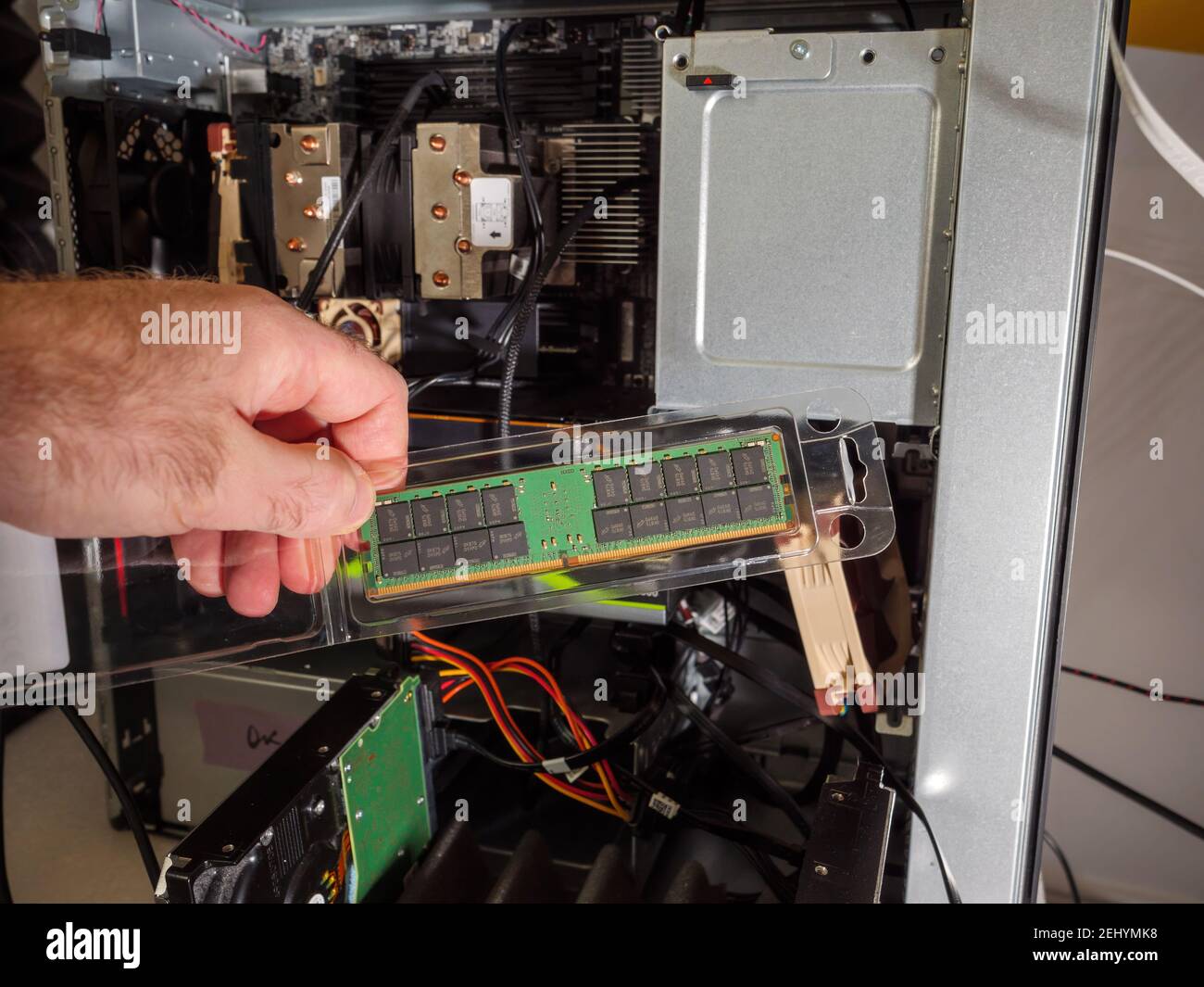 Paris, France- Feb 4, 2021: POV male hand holding new Computer RAM ...