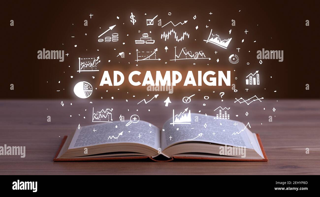 AD CAMPAIGN inscription coming out from an open book, business concept ...