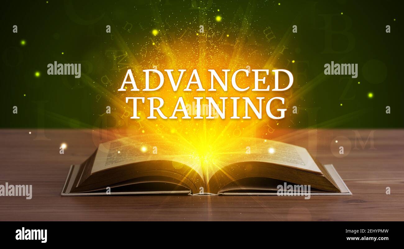 ADVANCED TRAINING inscription coming out from an open book, educational ...