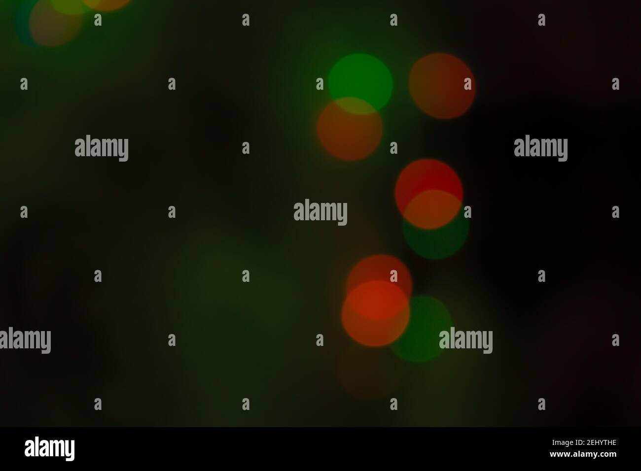 Defocused Image Of Illuminated Lights.Boke. Lights on a black ...