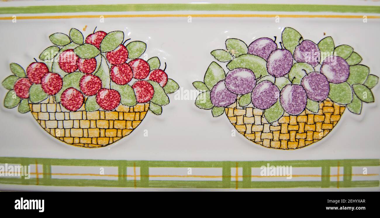 White ceramic tiles with fruit motives for the decoration of walls and ...