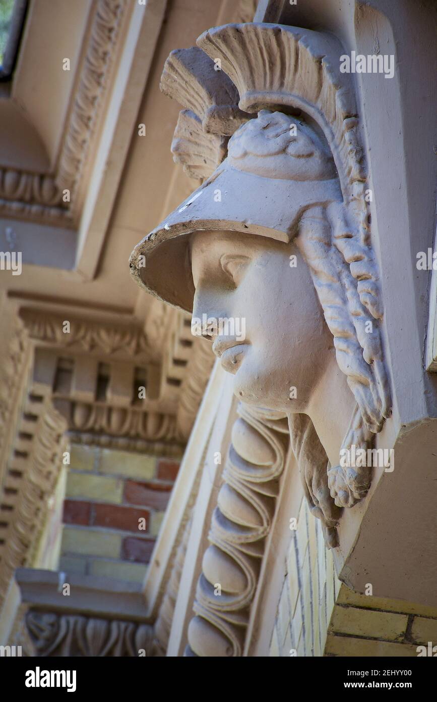 Vertical low angle shot of a human's head statue on the building Stock ...