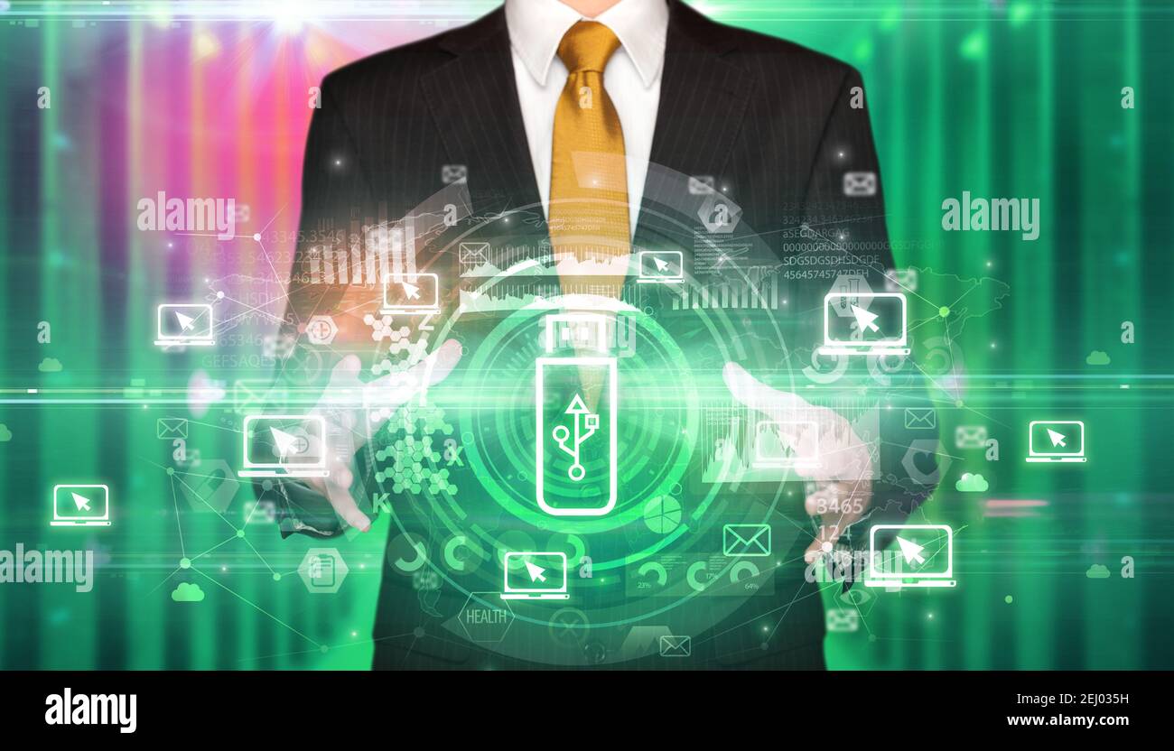 Businessman holding data carrier icon in his hands with multiple ...