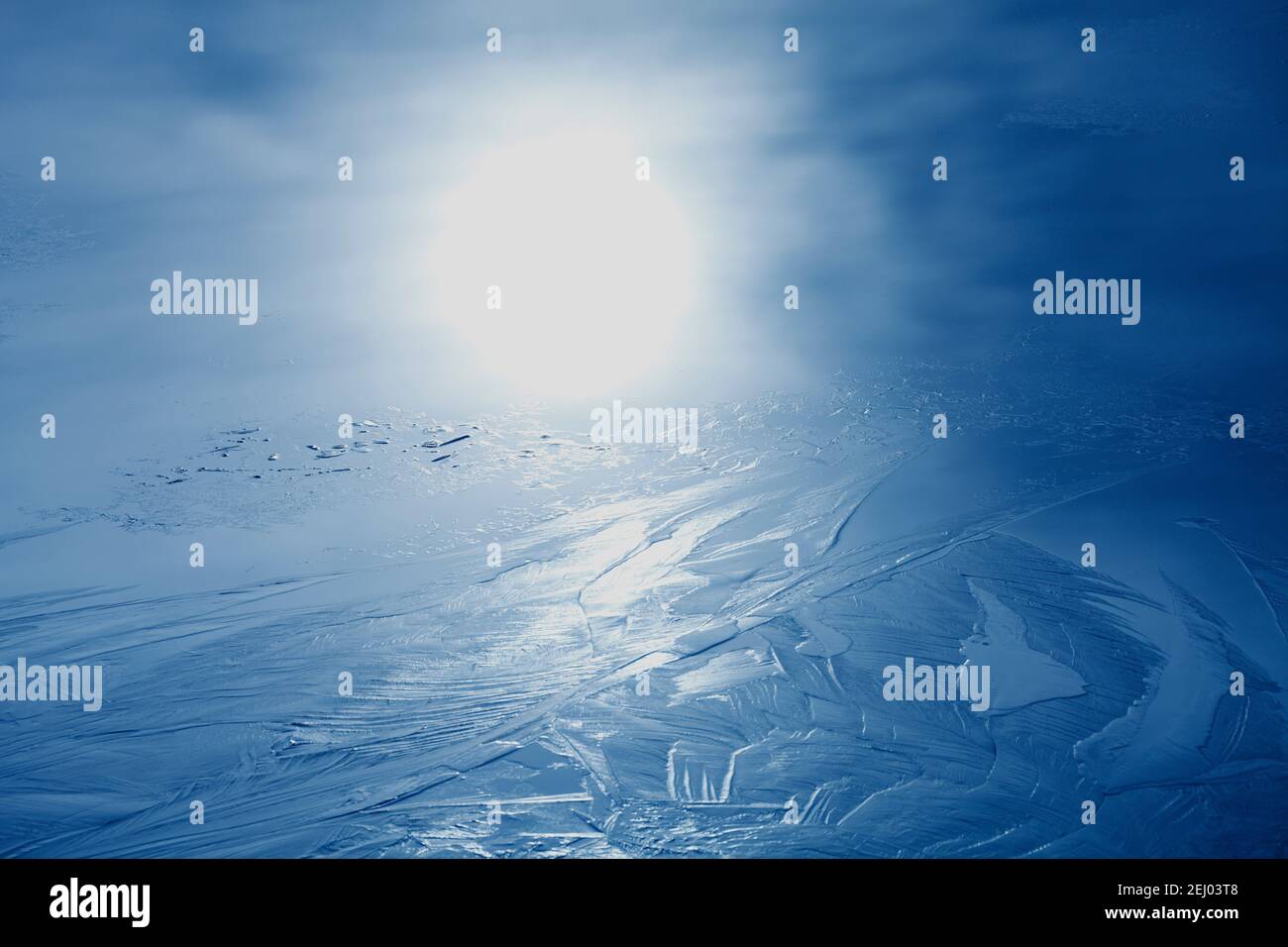The sun reflects to the frozen glacier lake at Iceland Stock Photo - Alamy