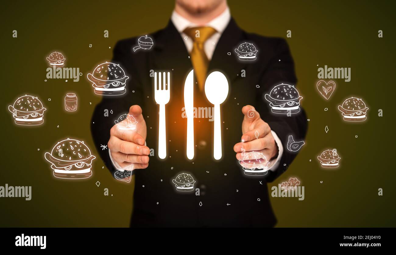 Hand holding cutlery icon, healthy food delivery concept Stock Photo ...