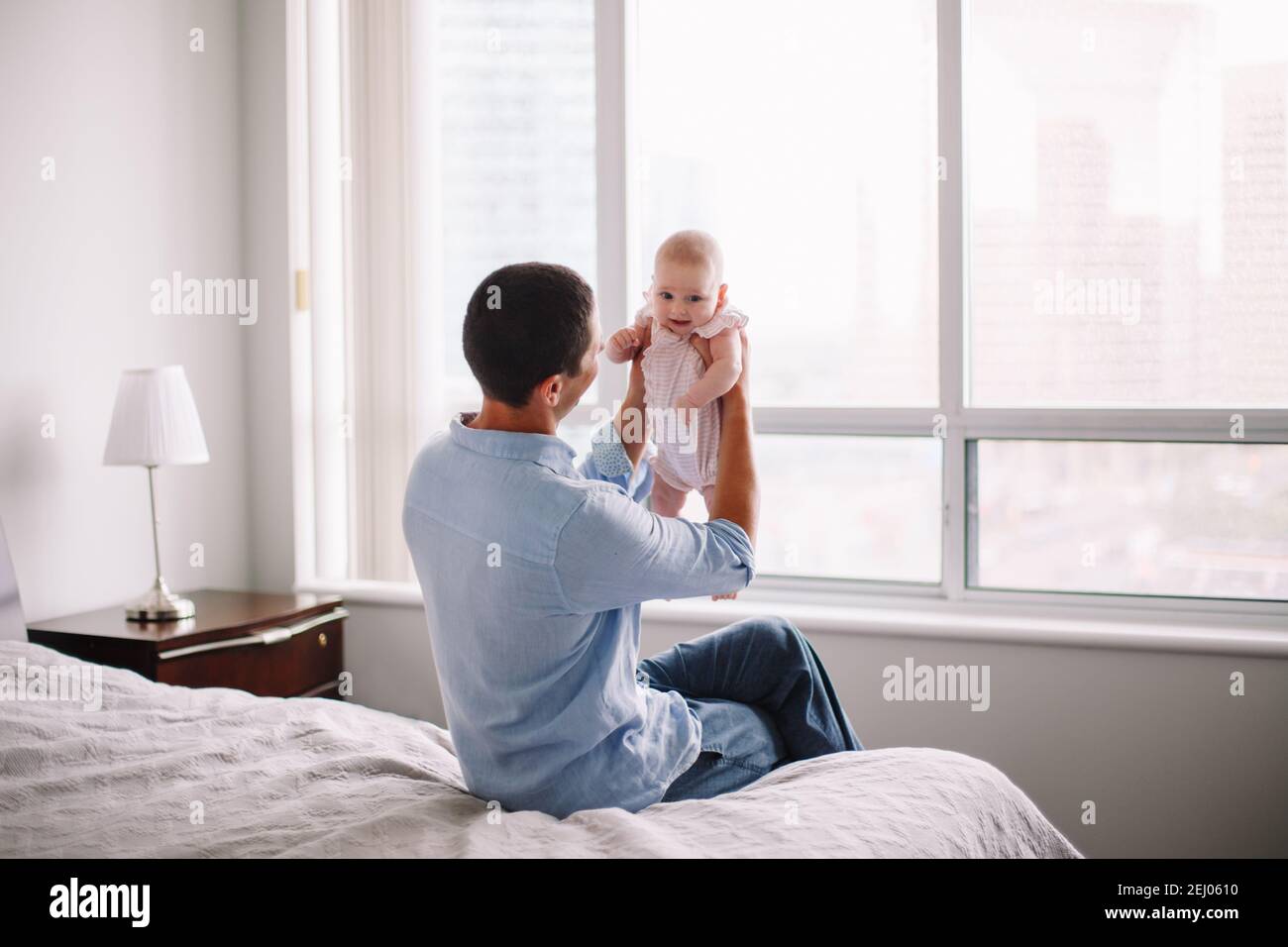 Fathers Day holiday. Middle age Caucasian father hugging and kissing ...