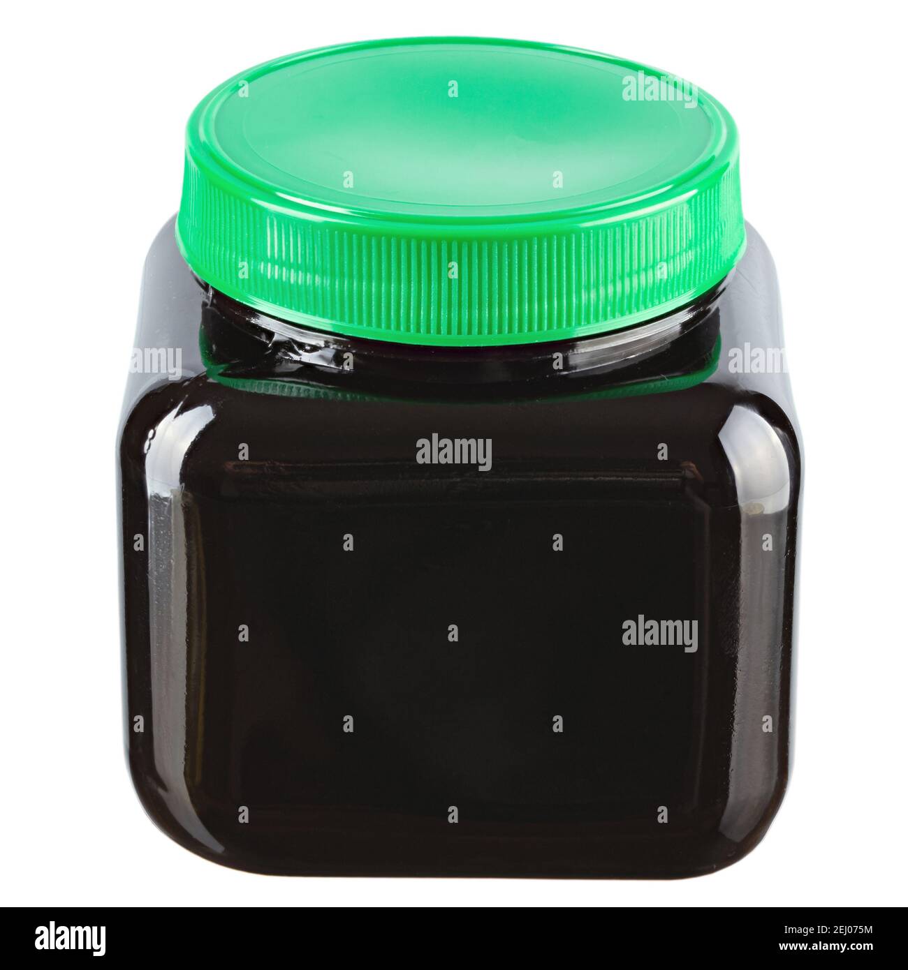 Empty dark colored glass jar with green lid isolated on white ...