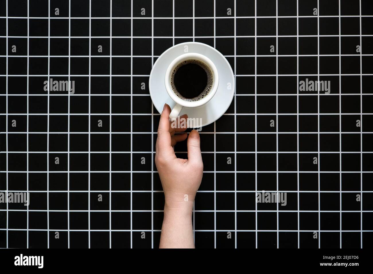 Caffeine and sleep problems. Drinking coffee before bed. A cup of black ...