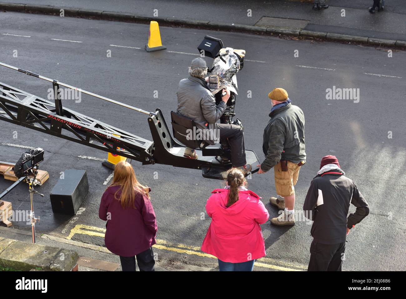 Filming cameraman on crane platform on outdoor location shoot Stock ...