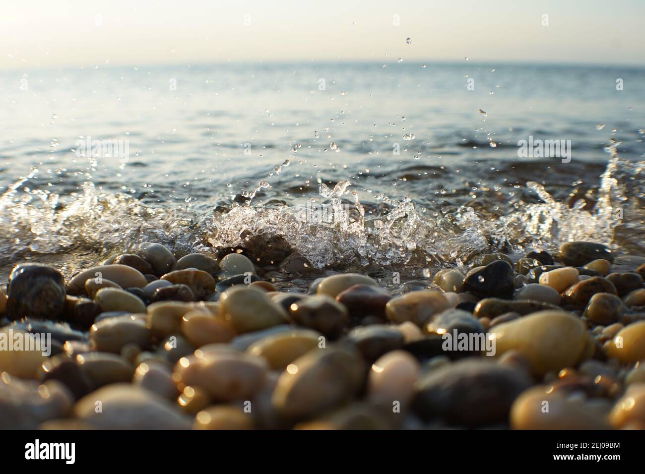 Pebbles on the shore line Stock Photo - Alamy