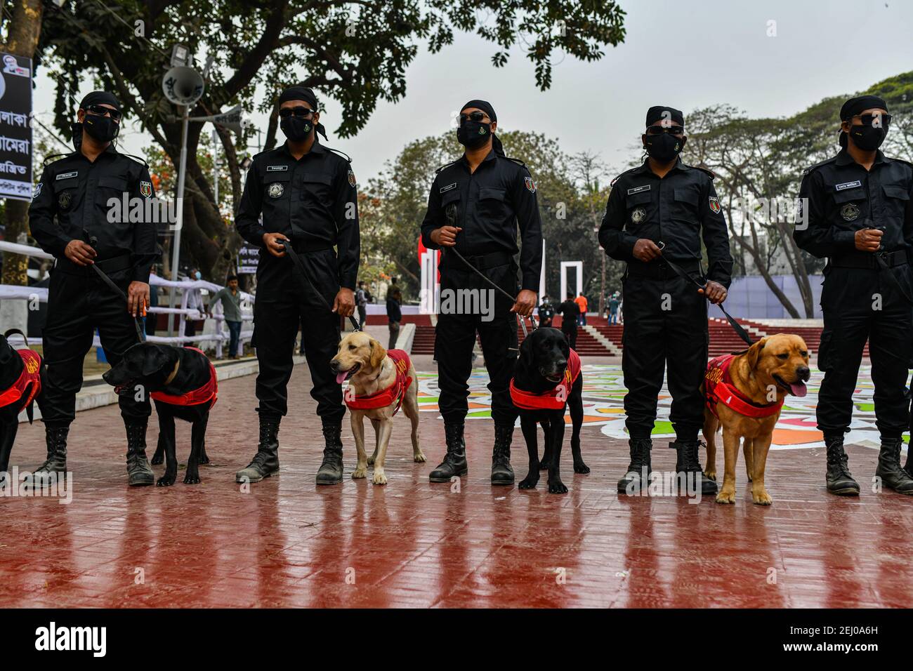 RAB dog squad stand in front of the Central Shaheed Minar in the ...
