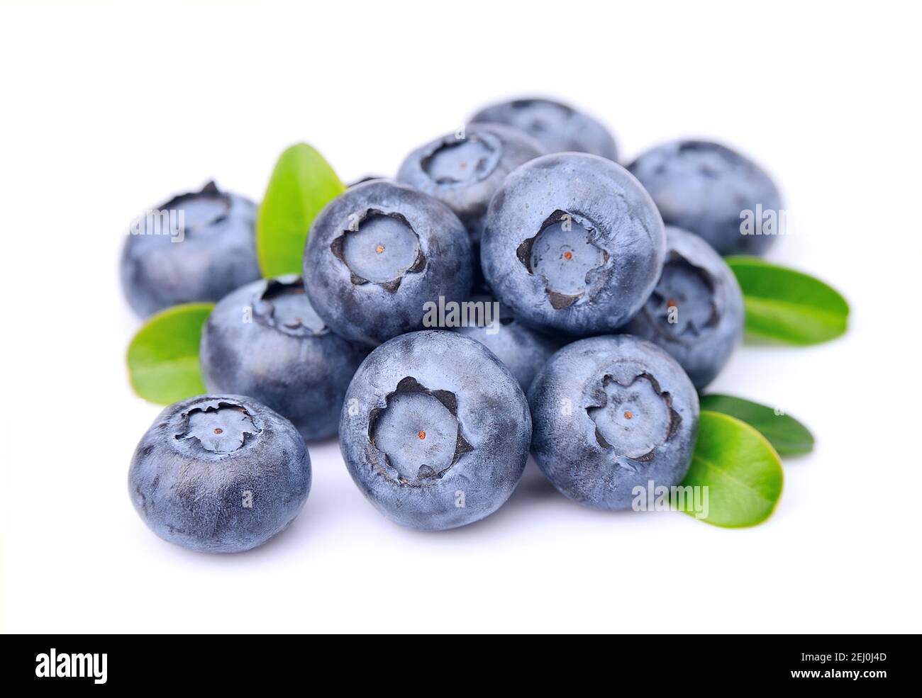 Sweet blueberries with leaves close up Stock Photo - Alamy